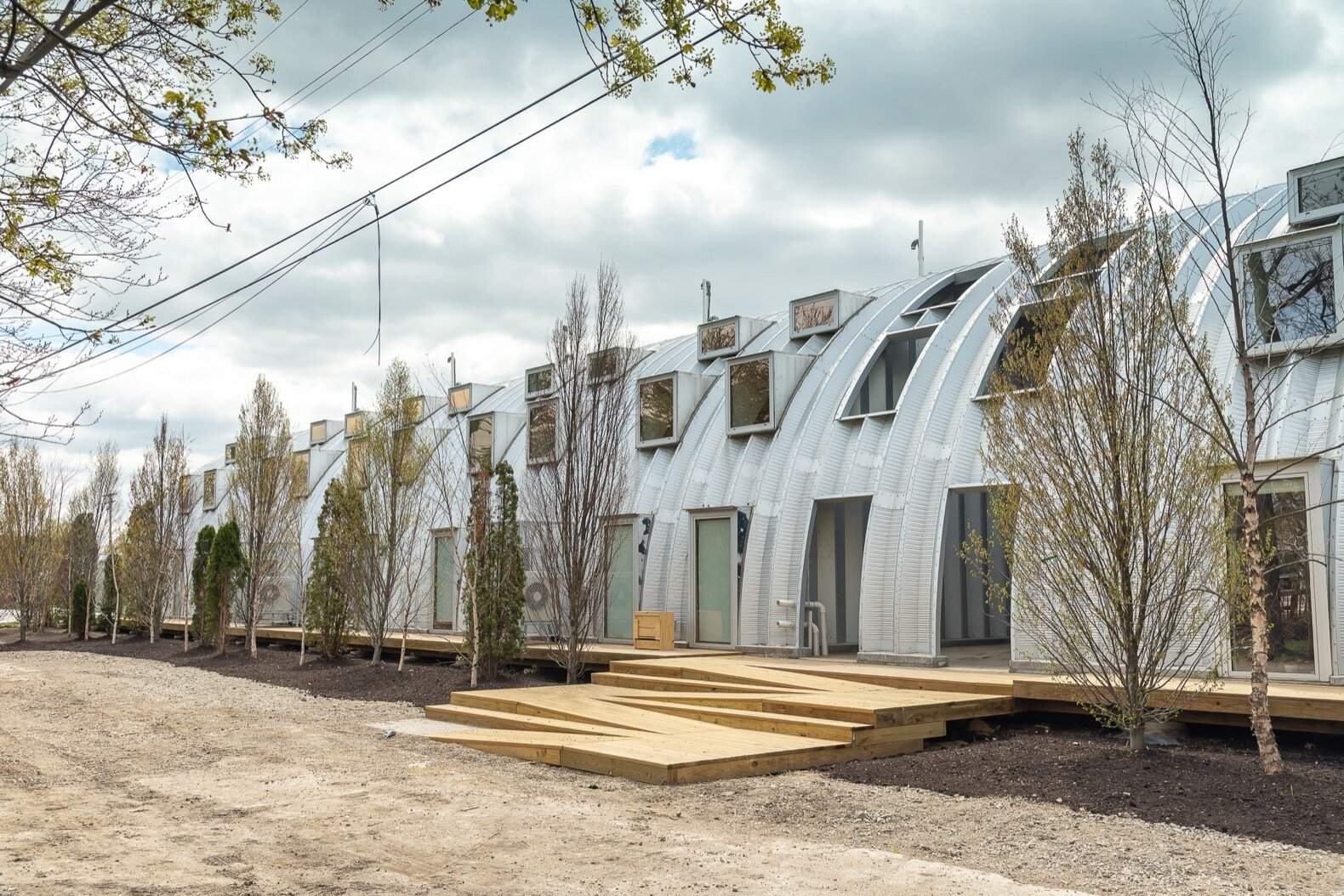 Photo 1 of 17 in A Massive Metal “Caterpillar” Brings Eight Cost ...