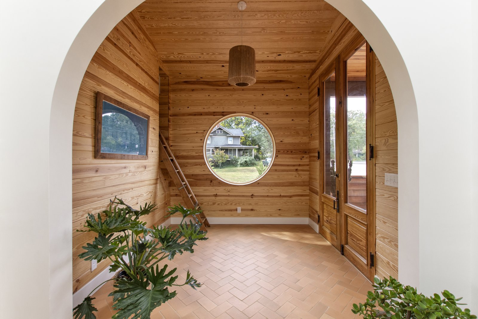 Photo 4 of 18 in A Sun-Catching Atrium With Delightful Archways Anchors ...