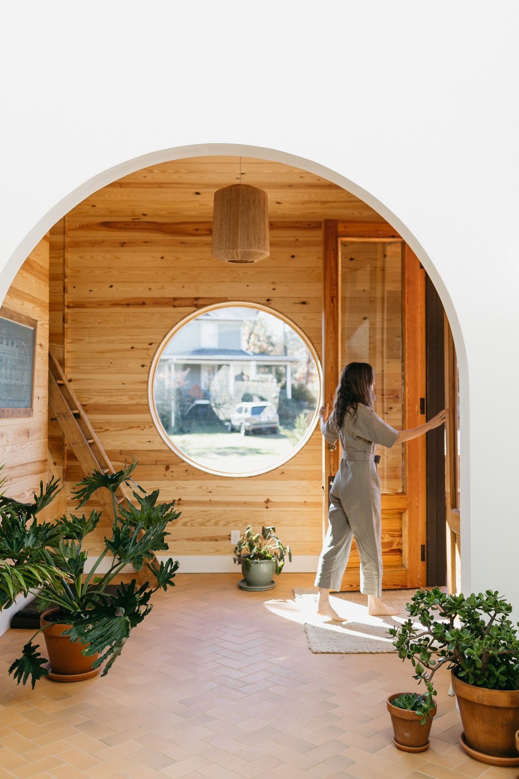 Photo 9 of 18 in A Sun-Catching Atrium With Delightful Archways Anchors ...