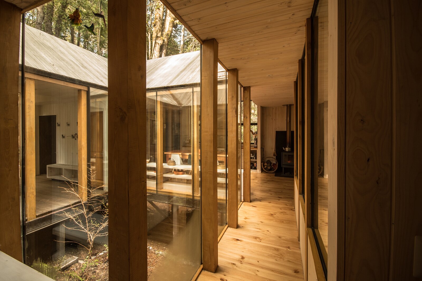 Photo 6 of 9 in A Minimalist, Wood-and-Glass Cabin Nestles Into a ...