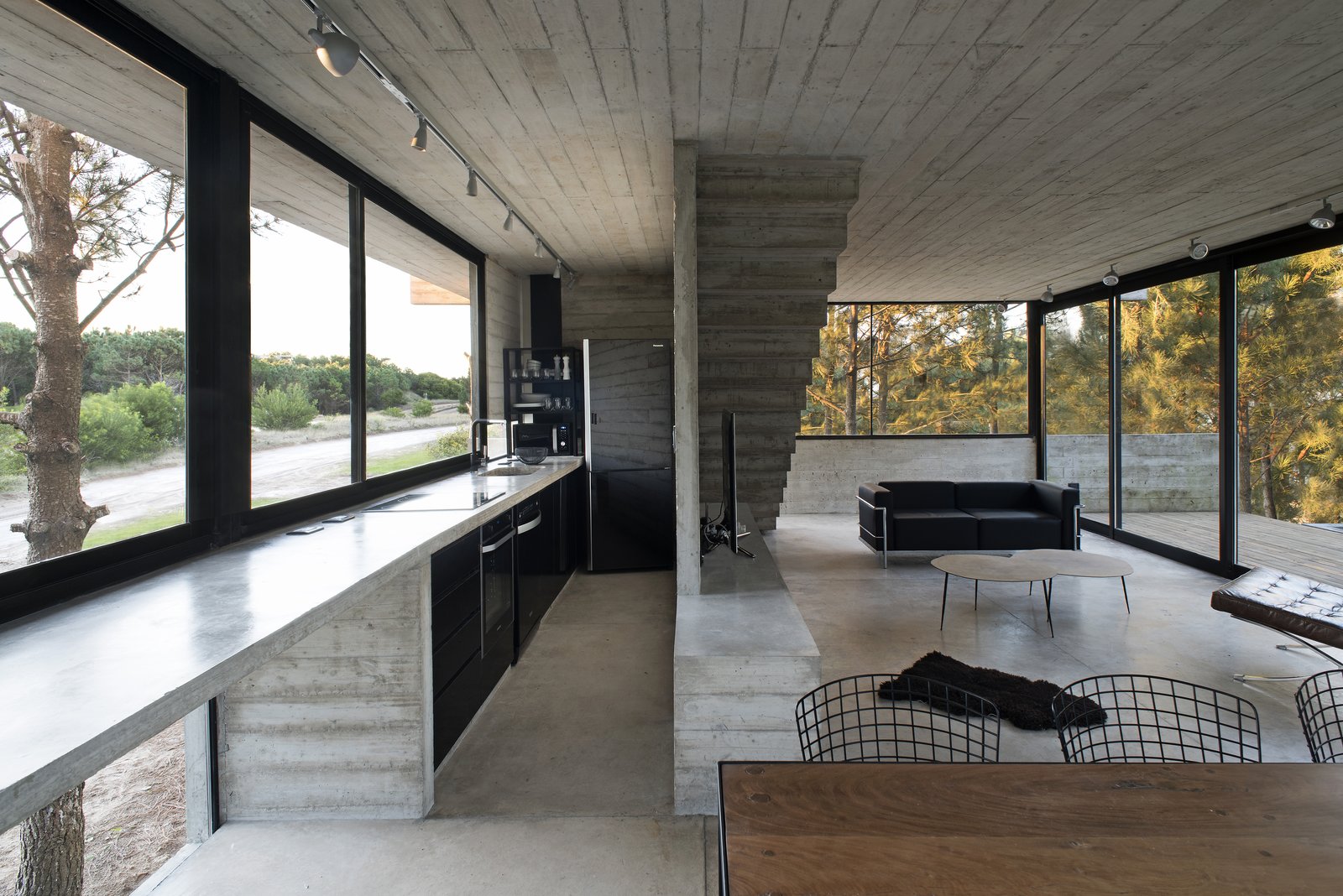 Photo 5 of 10 in This Monolithic Concrete House Appears to Float Among ...