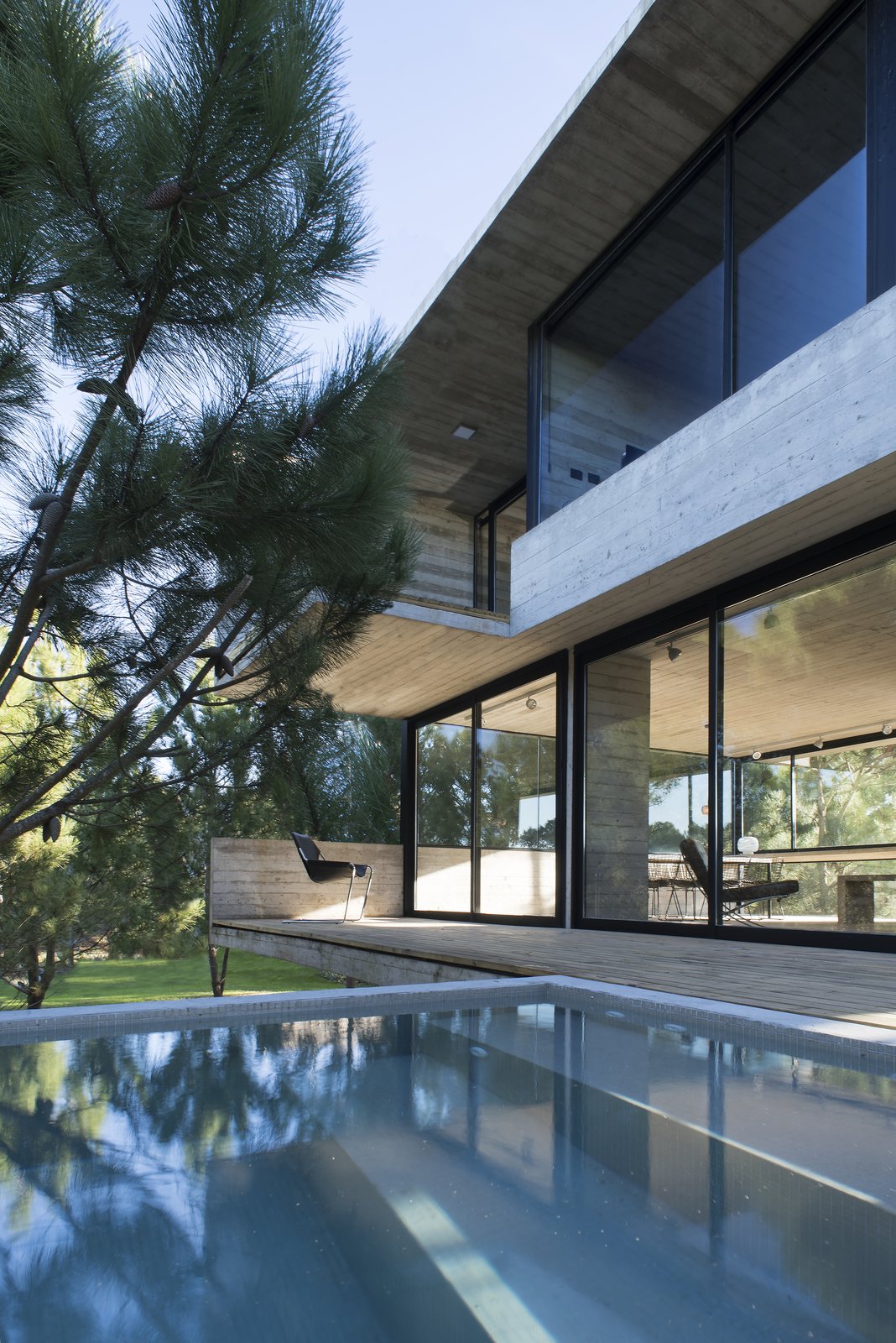 Photo 6 of 10 in This Monolithic Concrete House Appears to Float Among ...