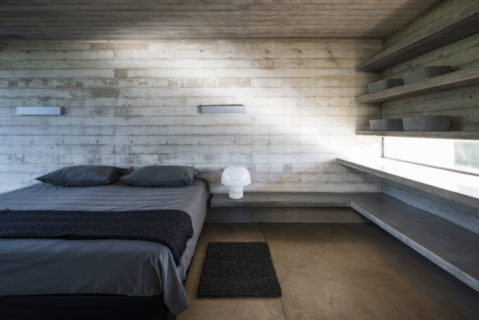 Photo 10 of 10 in This Monolithic Concrete House Appears to Float Among ...