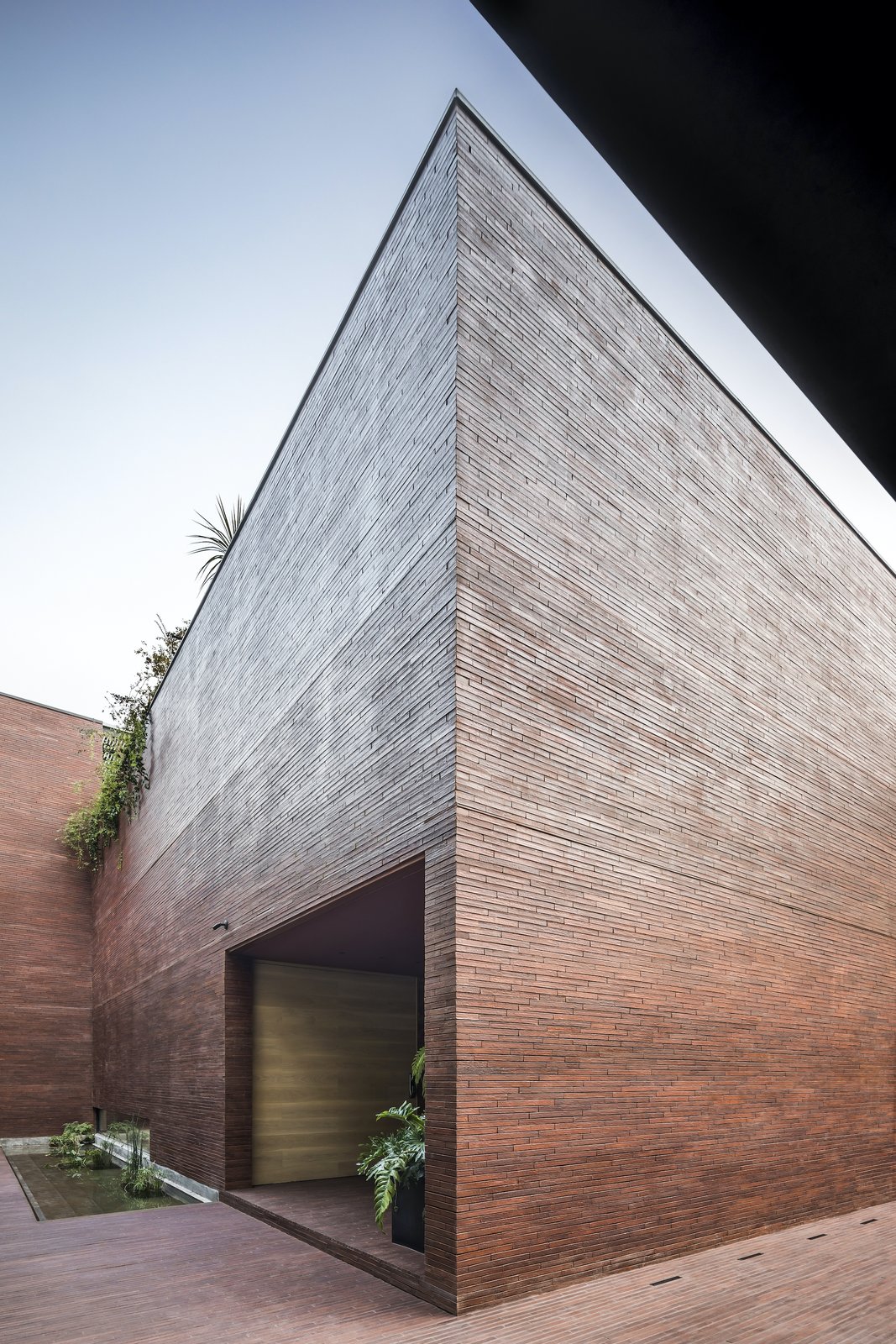 Photo 1 of 18 in An Introspective Brick Home in Mexico City Wraps ...