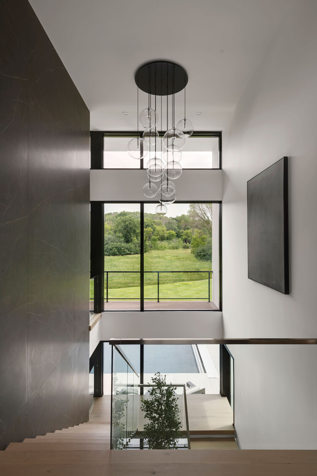 Photo 14 of 14 in A Glass Staircase and Striking Rear Facade Define ...