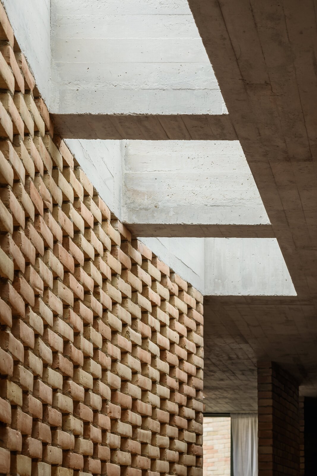 Photo 15 of 19 in A Curvaceous Brick Home Follows the Edge of a Forest ...