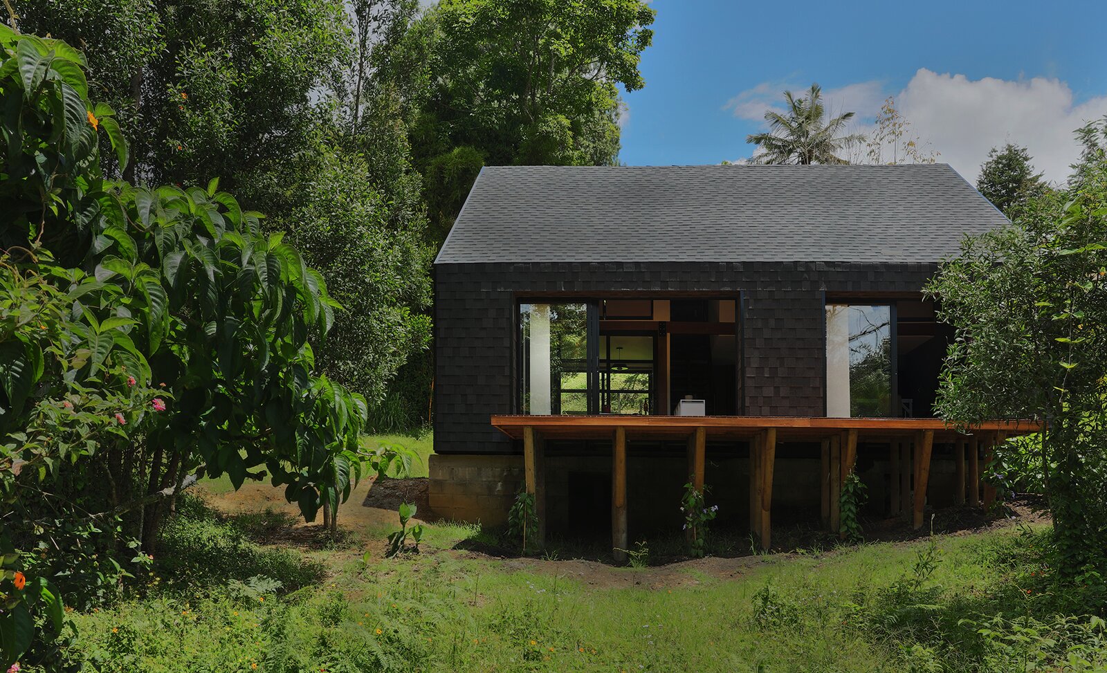 Photo 11 of 11 in A Colombian Cabin Uses Shingles as Camouflage in Its ...