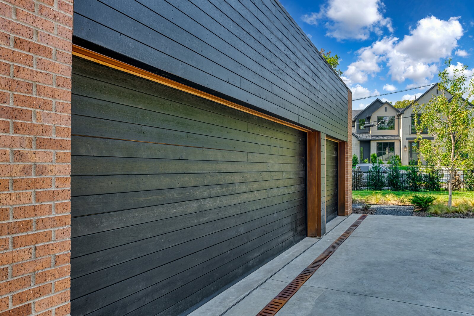 Photo 8 of 18 in Shou Sugi Ban Garage Doors by Doorvana Garage Doors ...