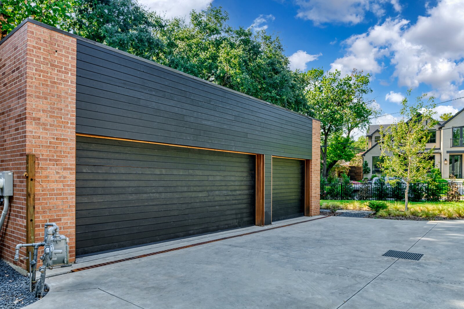 Photo 16 of 18 in Shou Sugi Ban Garage Doors by Doorvana Garage Doors ...