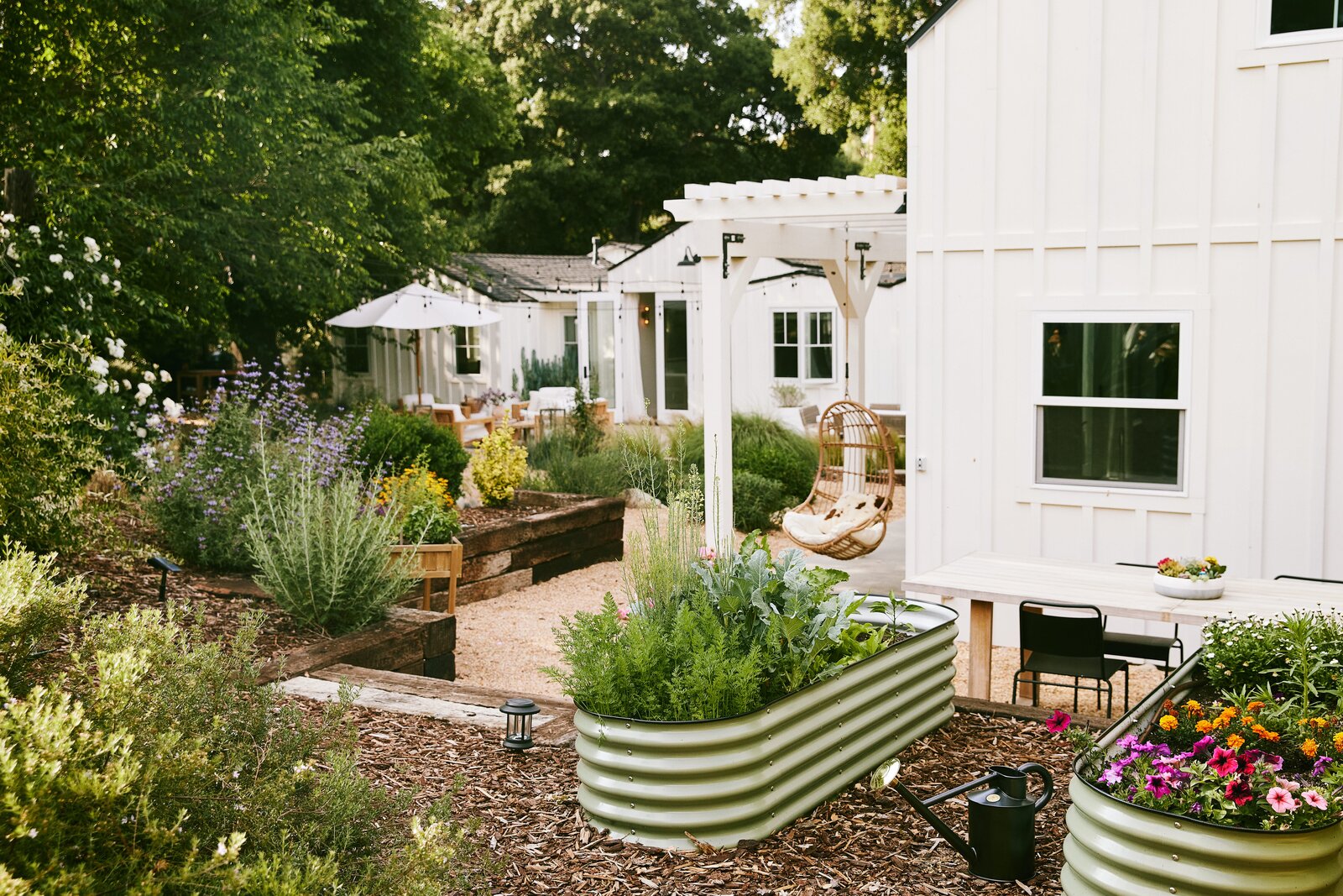 Photo 4 of 10 in Modern Farmhouse with Rewilded Backyard by Yardzen - Dwell