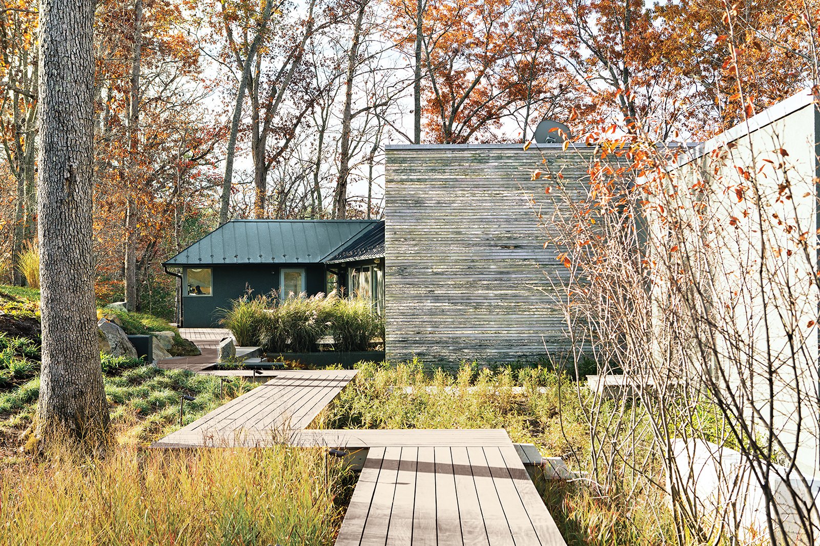 Photo 1 of 15 in How This Landscape Design Made a Home as Fun as a ...