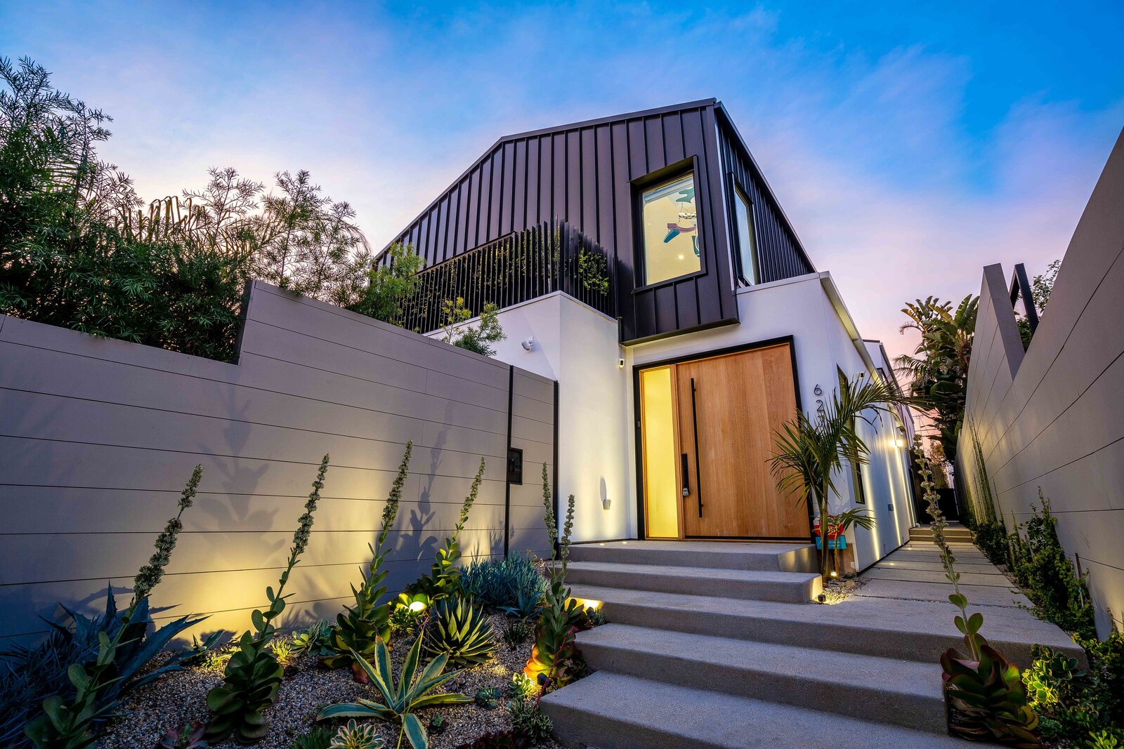 Photo 1 of 10 in This Sun-Filled Modern Duplex Asks $5.35M in the Heart ...