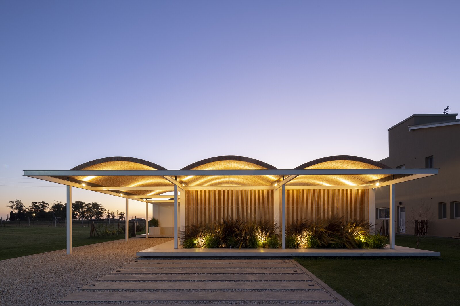 Photo 14 of 15 in A Rippling Brick Roof Caps a Sun-Kissed Home in ...