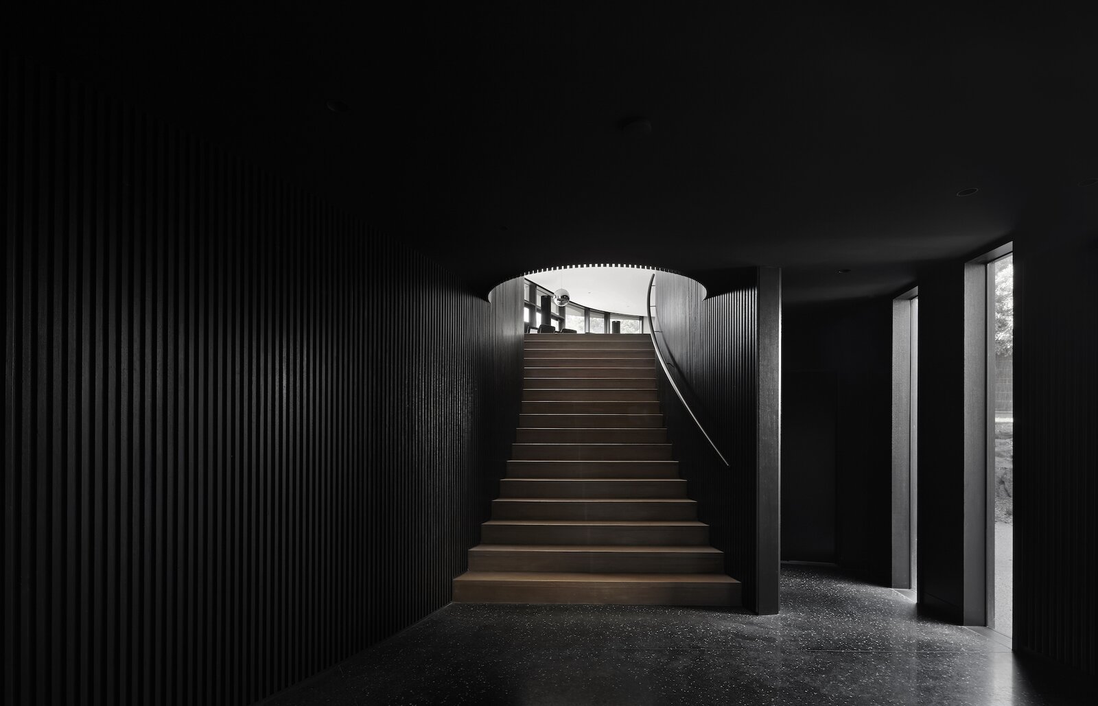 Photo 12 of 16 in An Undulating, Matte Black Home Hides a Secret Garden ...