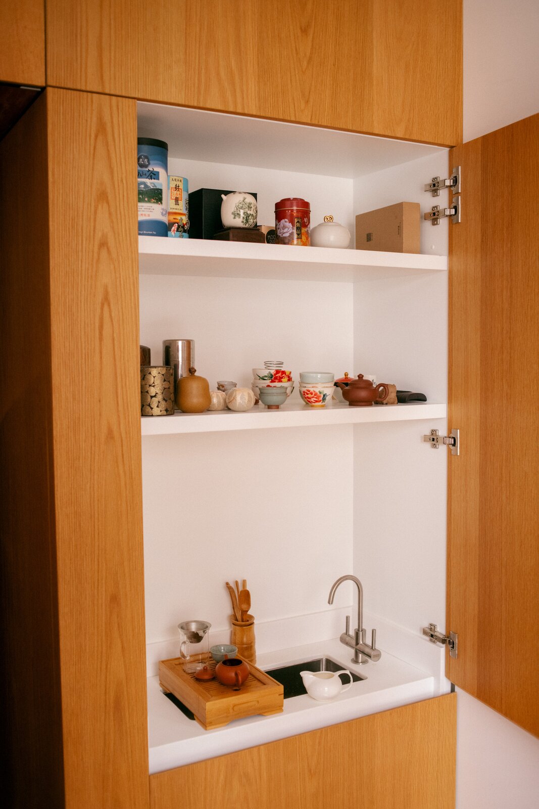 Photo 8 of 11 in A Multifunctional Storage Wall Solves a Tricky Spatial ...