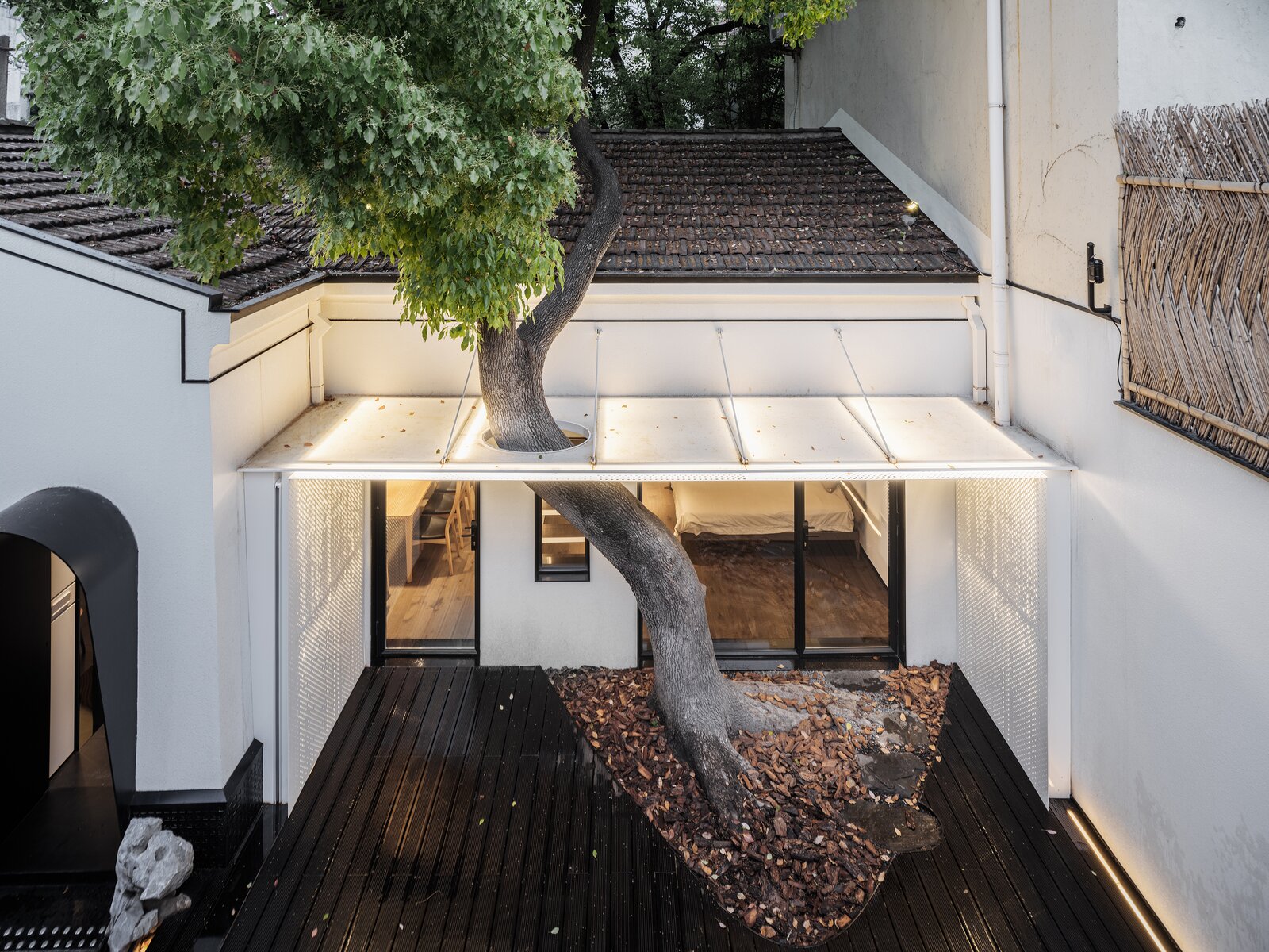 Photo 6 of 17 in A Volcanic-Rock Courtyard Energizes a Dramatic Home in ...