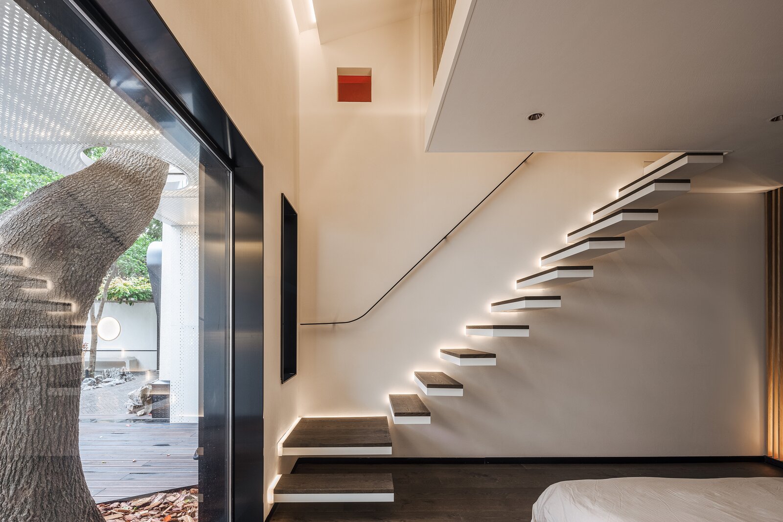 Photo 13 of 17 in A Volcanic-Rock Courtyard Energizes a Dramatic Home ...