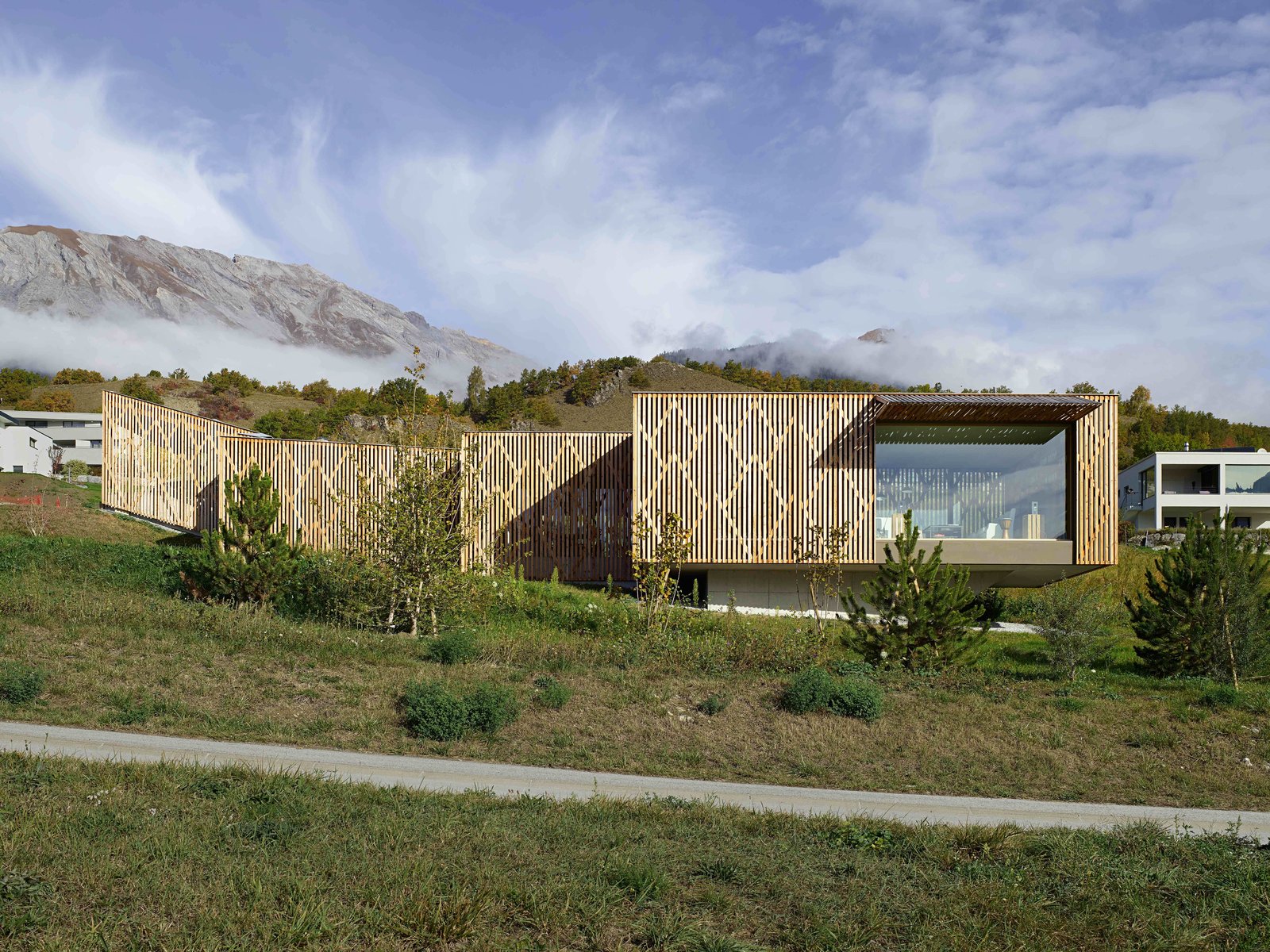 Photo 1 of 13 in A Green-Roofed Family Home Frames the Grandeur of the ...