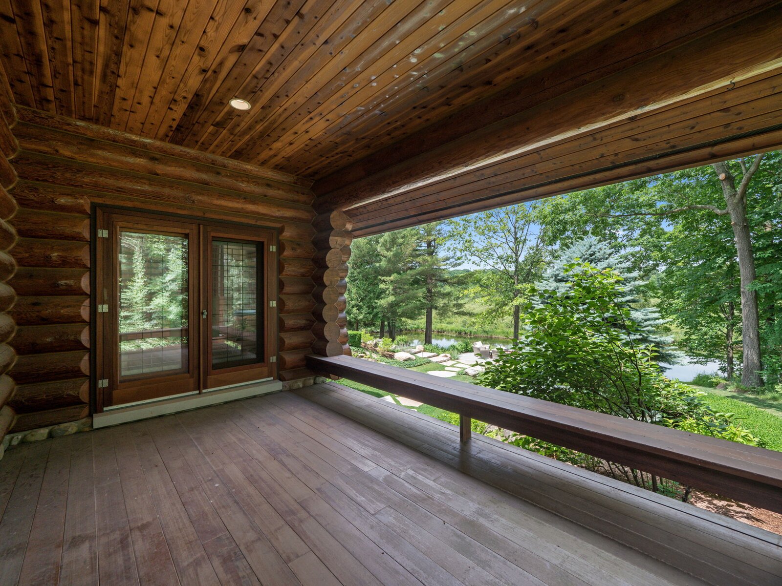 Photo 14 of 24 in Embracing Nature and Elegance in a Michigan Log Residence by Luxury Homes ...