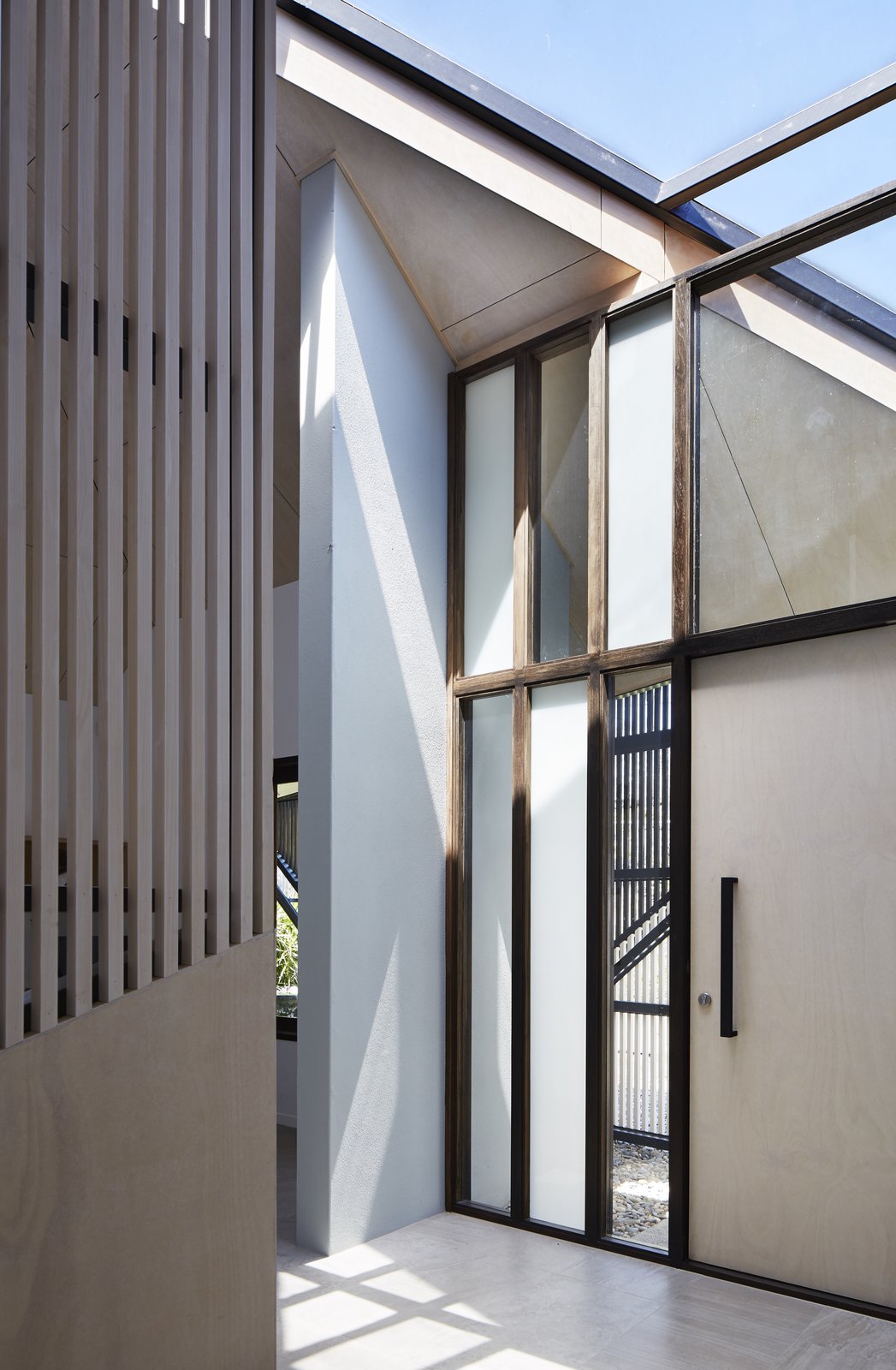 Photo 3 of 12 in An Edgy Slatted Facade Conceals a Striking Indoor ...