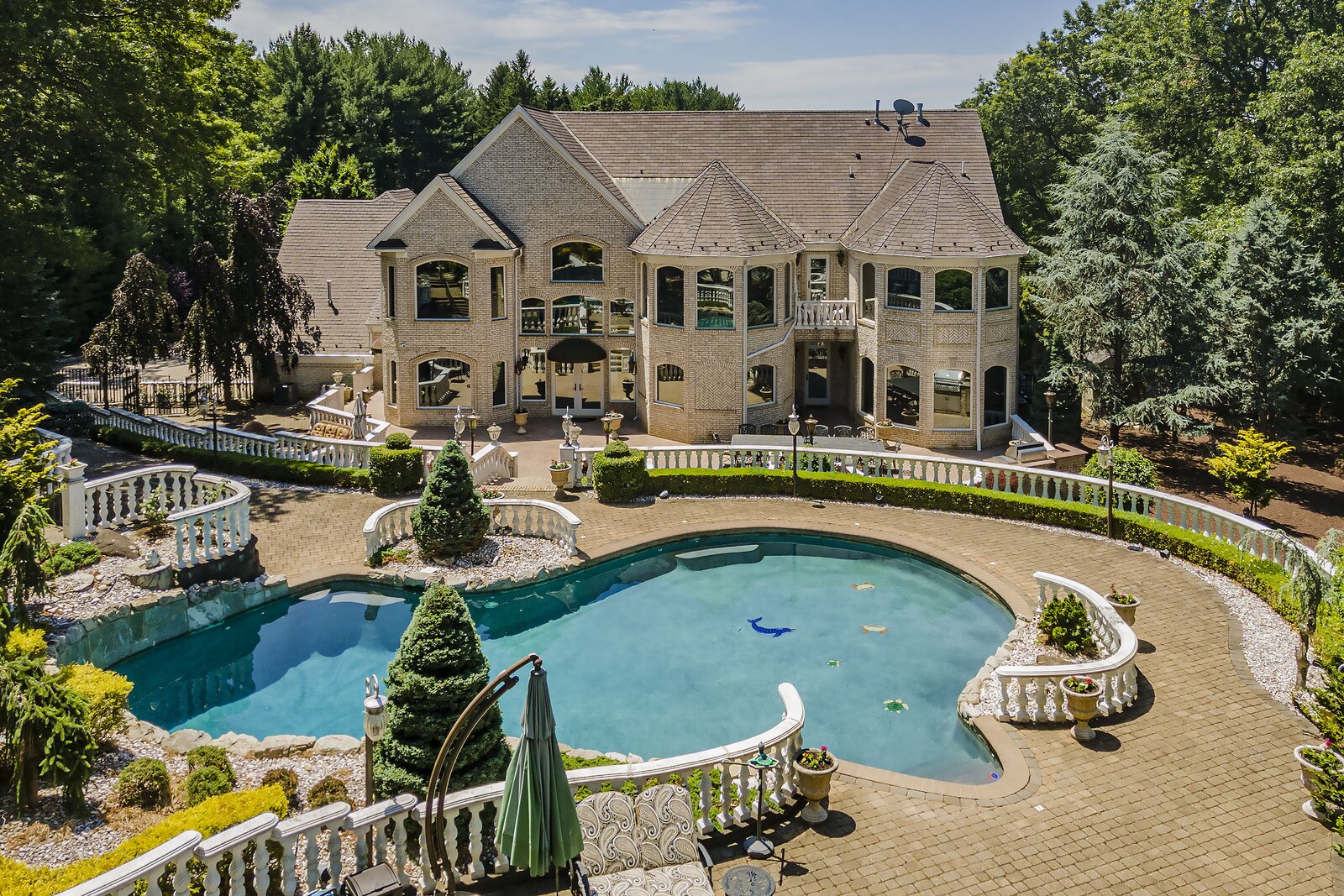 An Ornate New Jersey Estate With a Pool and Home Theater Asks $3.6M - Dwell