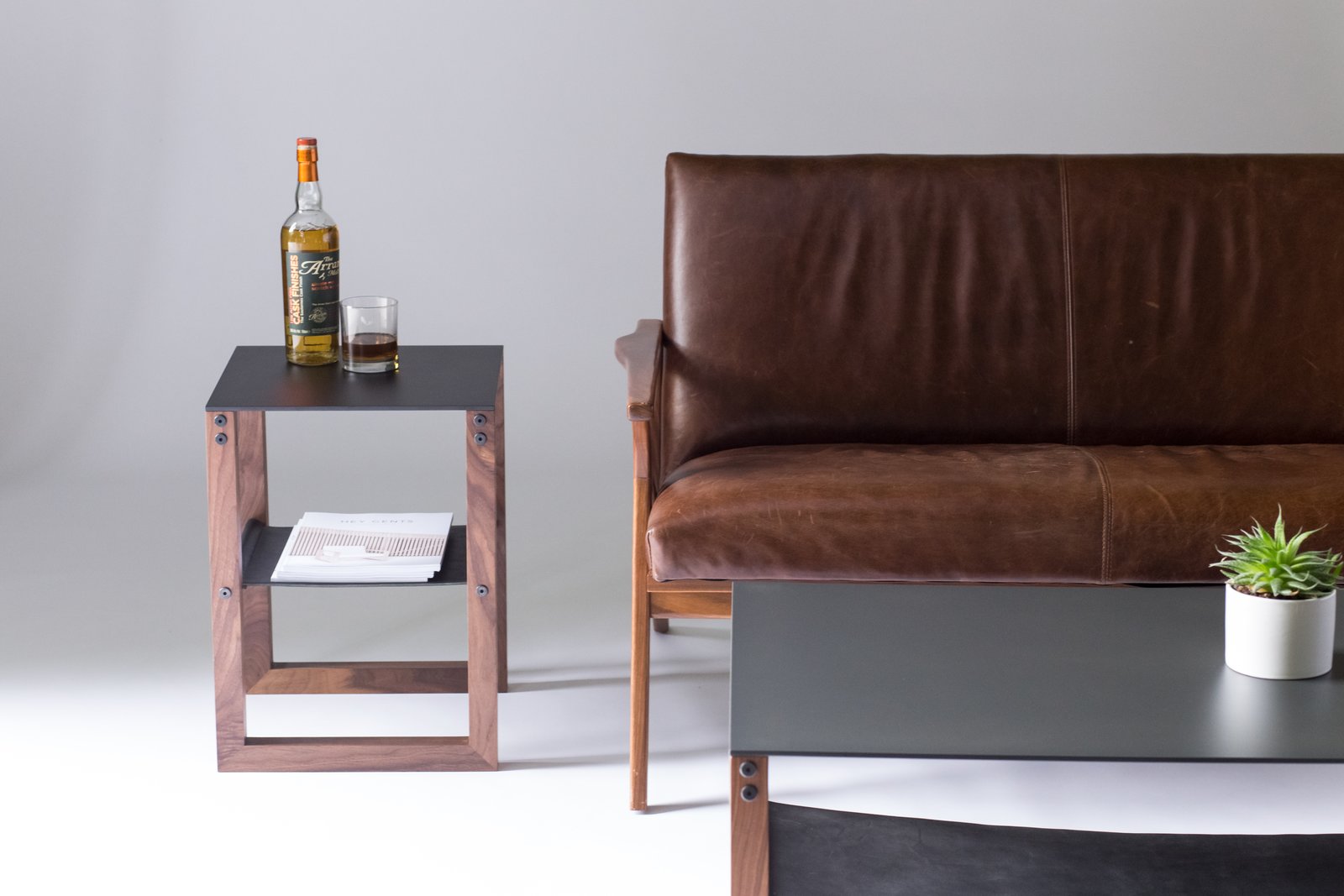 Photo 6 of 8 in THE SLING SIDE TABLE walnut|black by Harkavy Furniture - Dwell