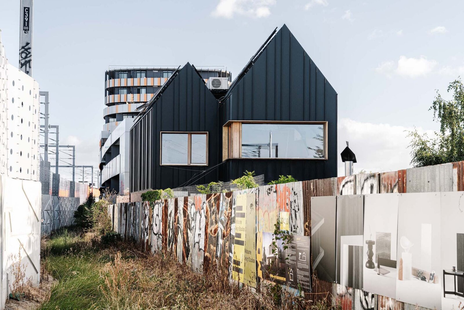 Photo 1 of 29 in A Striking Black Residence Energizes a Neglected Lot ...