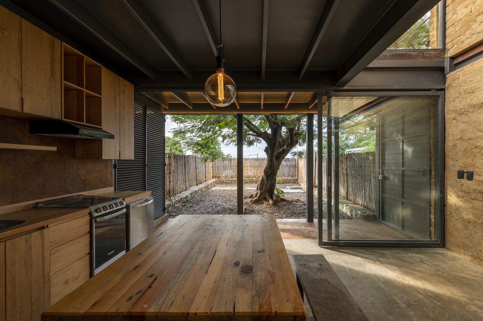 Photo 7 of 15 in Adobe, Brick, and Black Steel Combine in an Artist’s ...