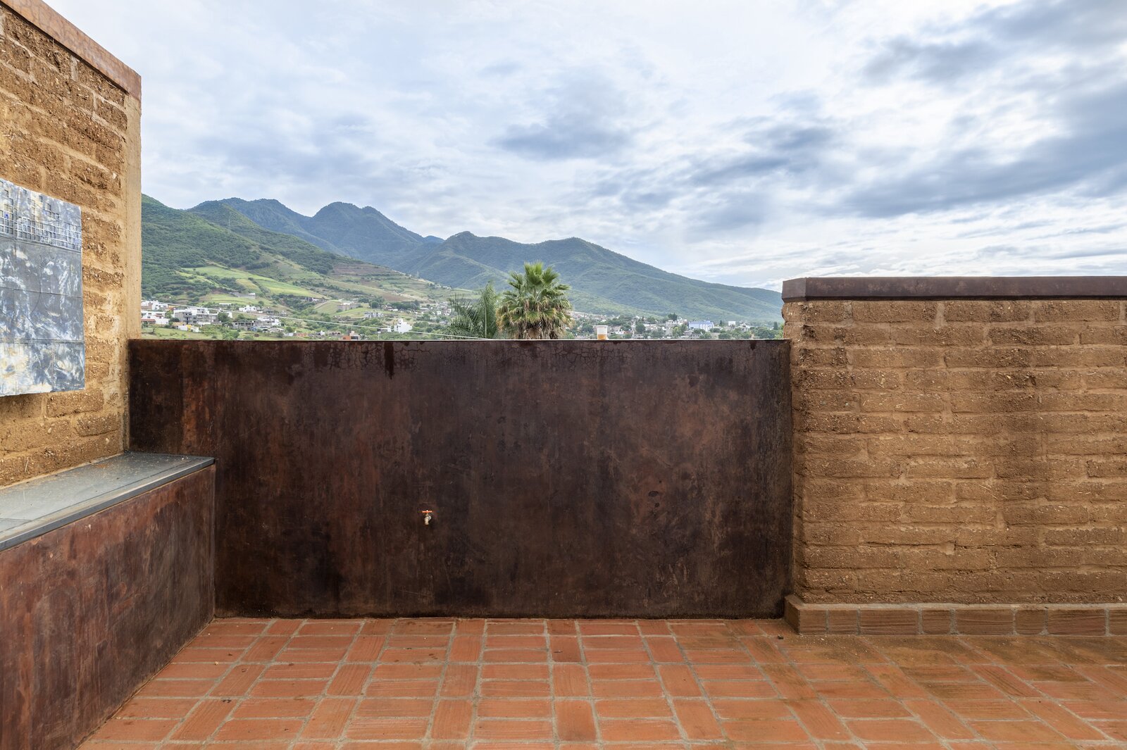 Photo 11 of 15 in Adobe, Brick, and Black Steel Combine in an Artist’s ...