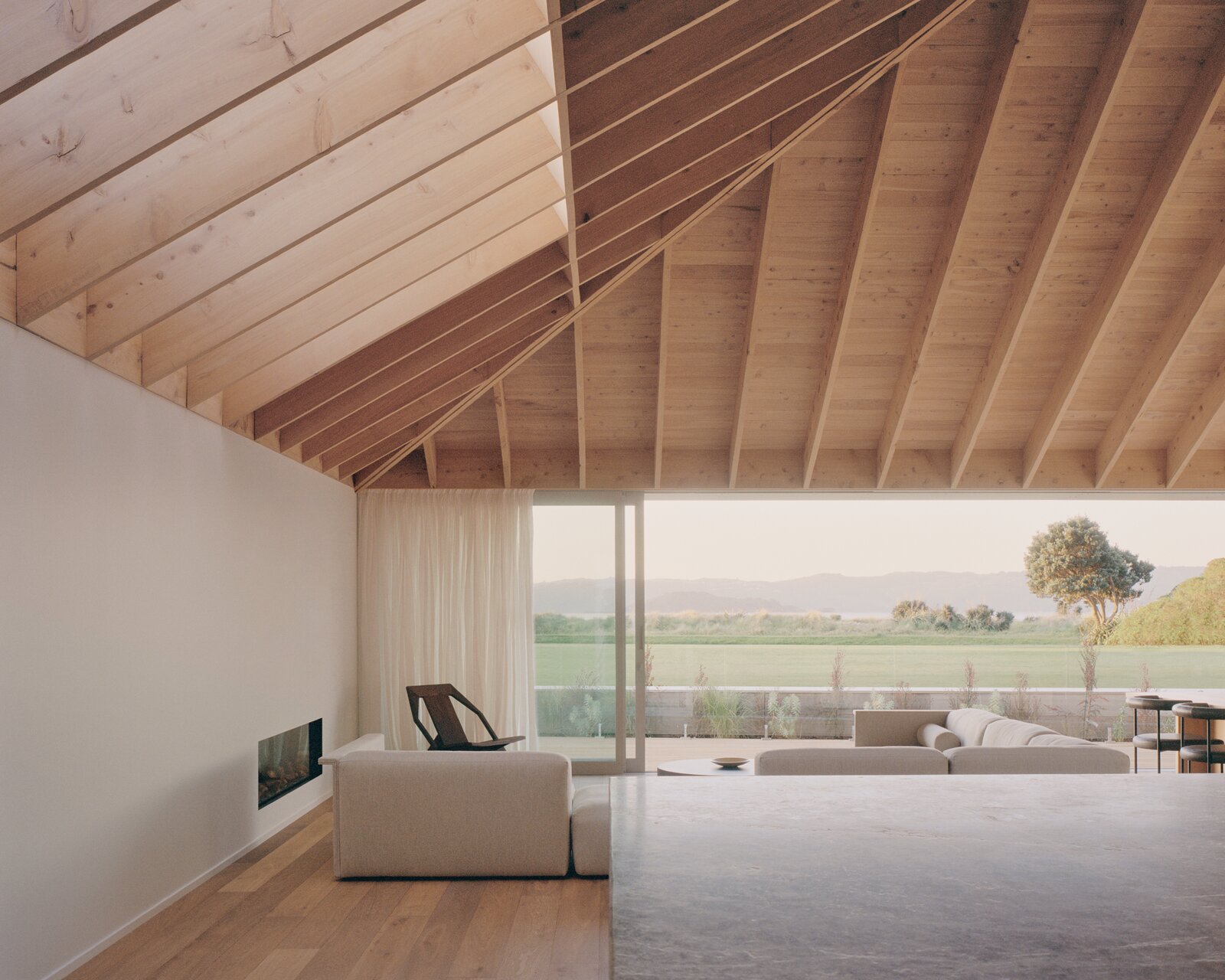 Photo 1 of 15 in Warm Wood Finishes Sandwich the White Interiors of a ...