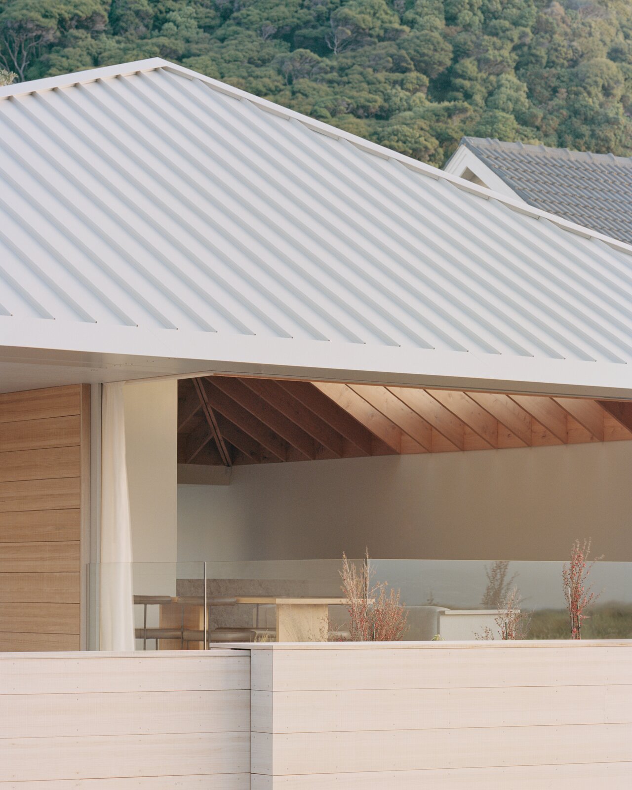 Photo 4 of 15 in Warm Wood Finishes Sandwich the White Interiors of a ...