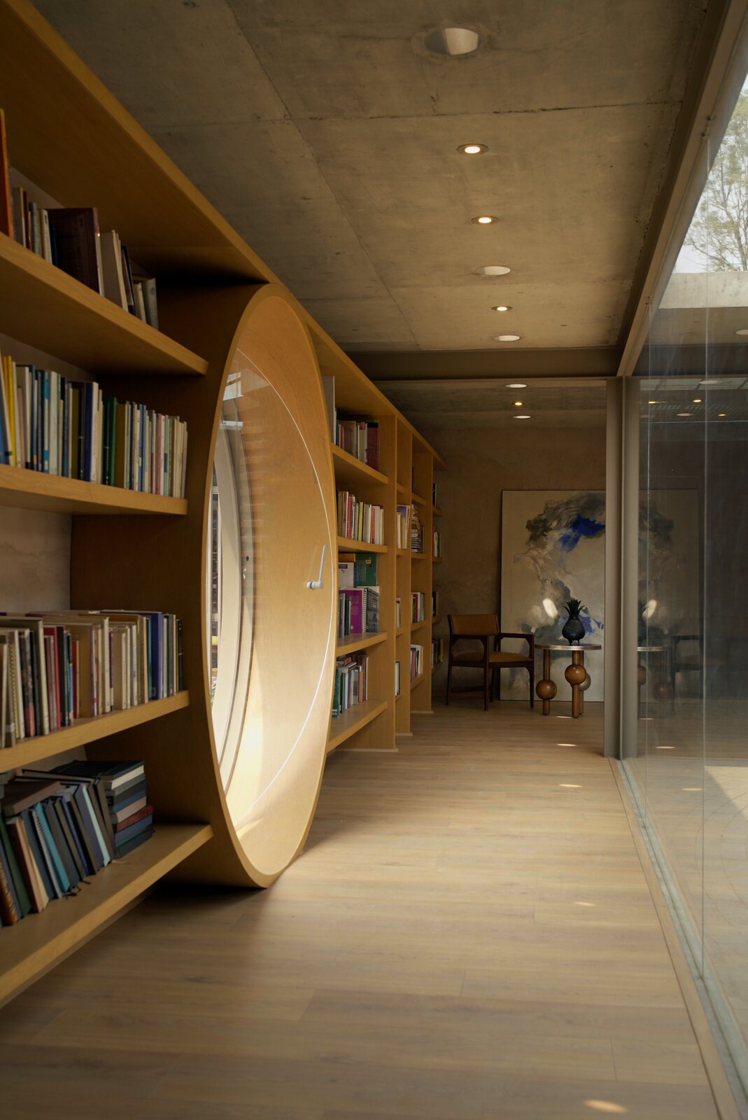 Photo 6 of 14 in A Brick-and-Concrete Home With a Library Emphasizes ...
