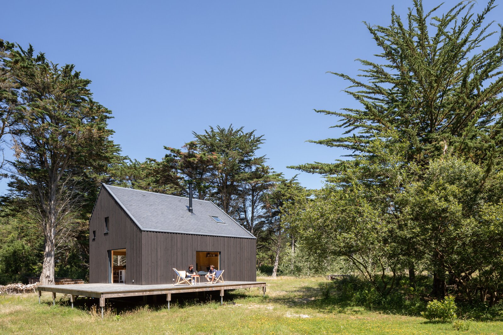 Photo 2 of 14 in An Angular Black Cabin in Coastal France Honors the ...
