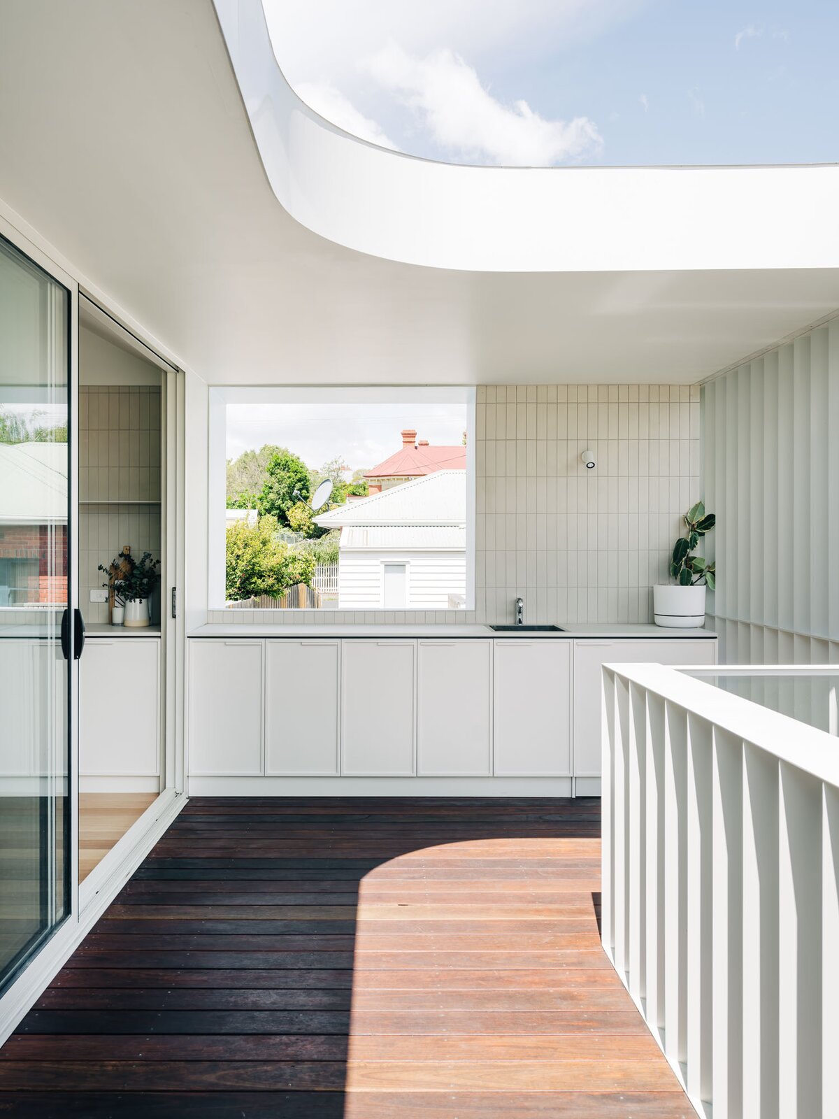 Photo 4 of 12 in A Crisp White One-Bed Addition Is Parked Atop a Two ...