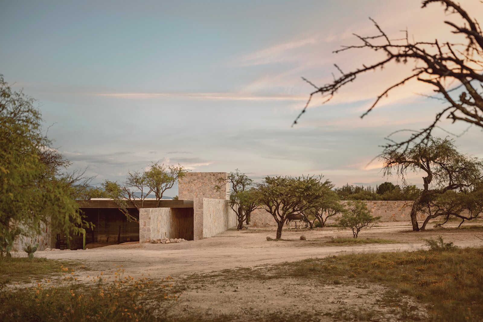 Photo 1 of 16 in In Mexico, Monolithic Stone Walls Make for a Home as ...