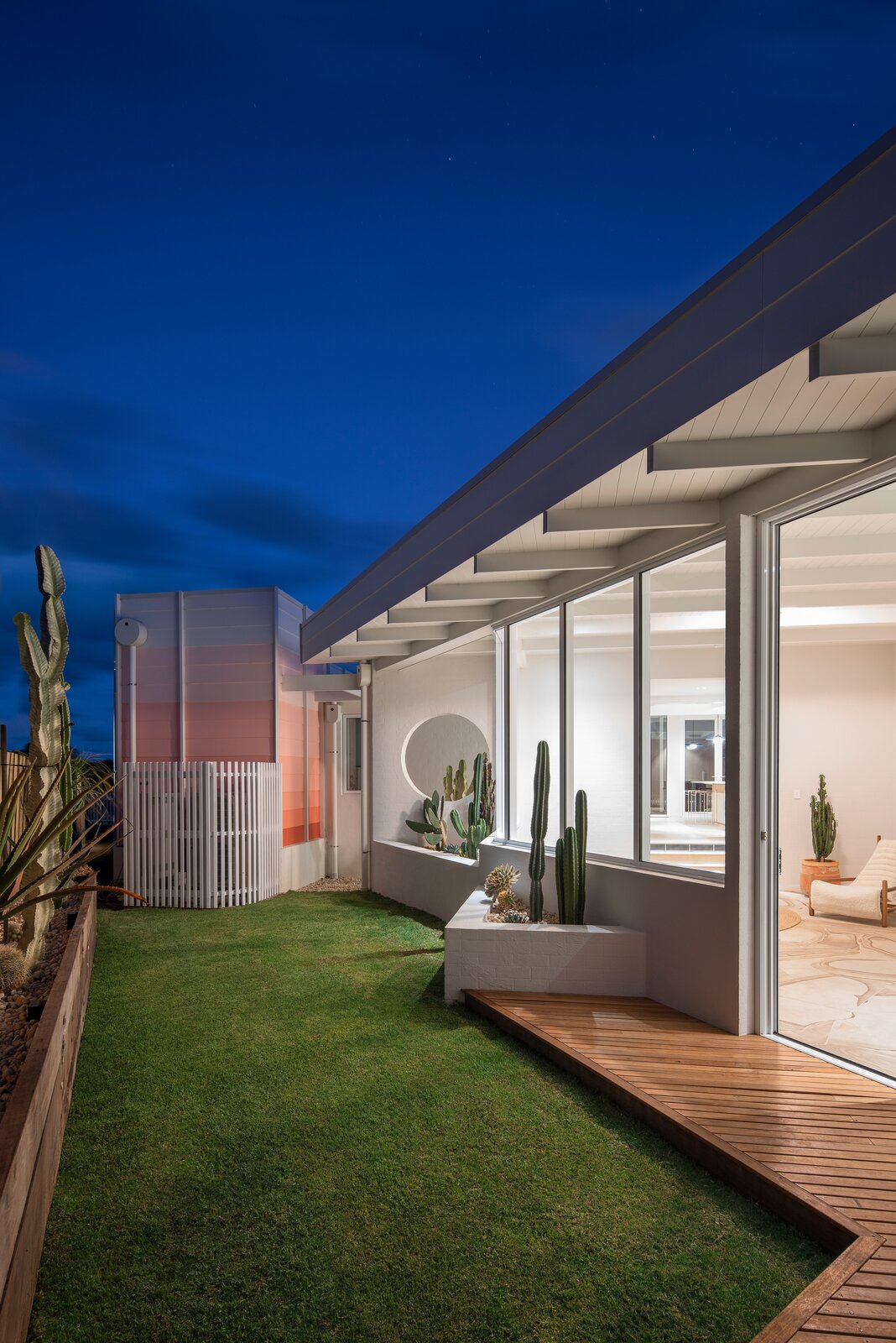 Photo 19 of 23 in This Elevated Australian Beach Shack Has a Vaporwave Sunset Facade - Dwell