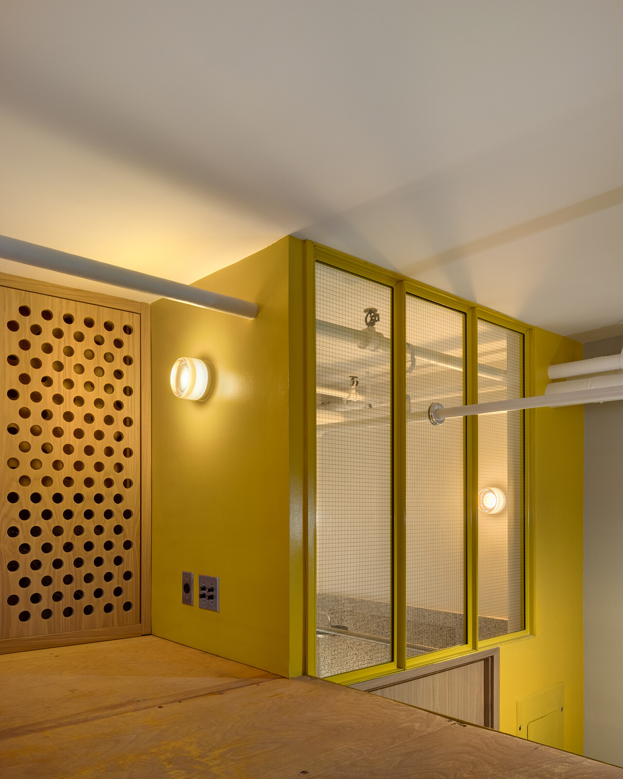 Photo 13 of 15 in A Yellow Floor-to-Ceiling Library Wall Brightens Up ...