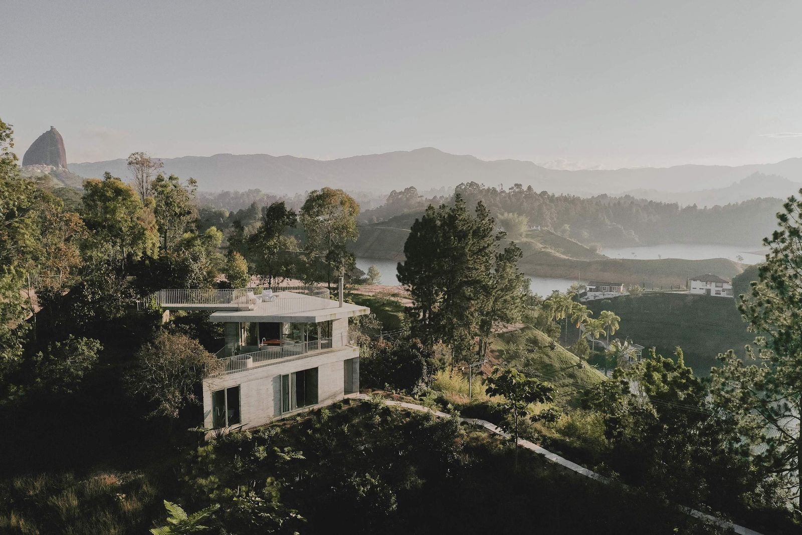 Photo 1 of 13 in Stacked Geometric Shapes Form a Hillside Concrete Home ...