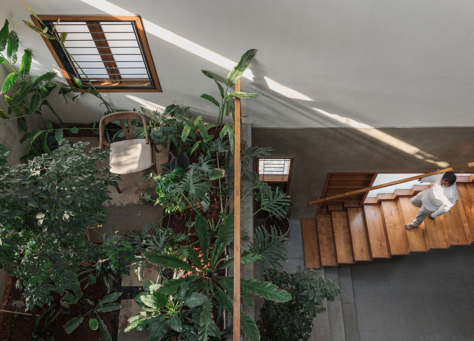 Photo 9 of 20 in The Skylight Steals the Show at This Vertical Concrete ...