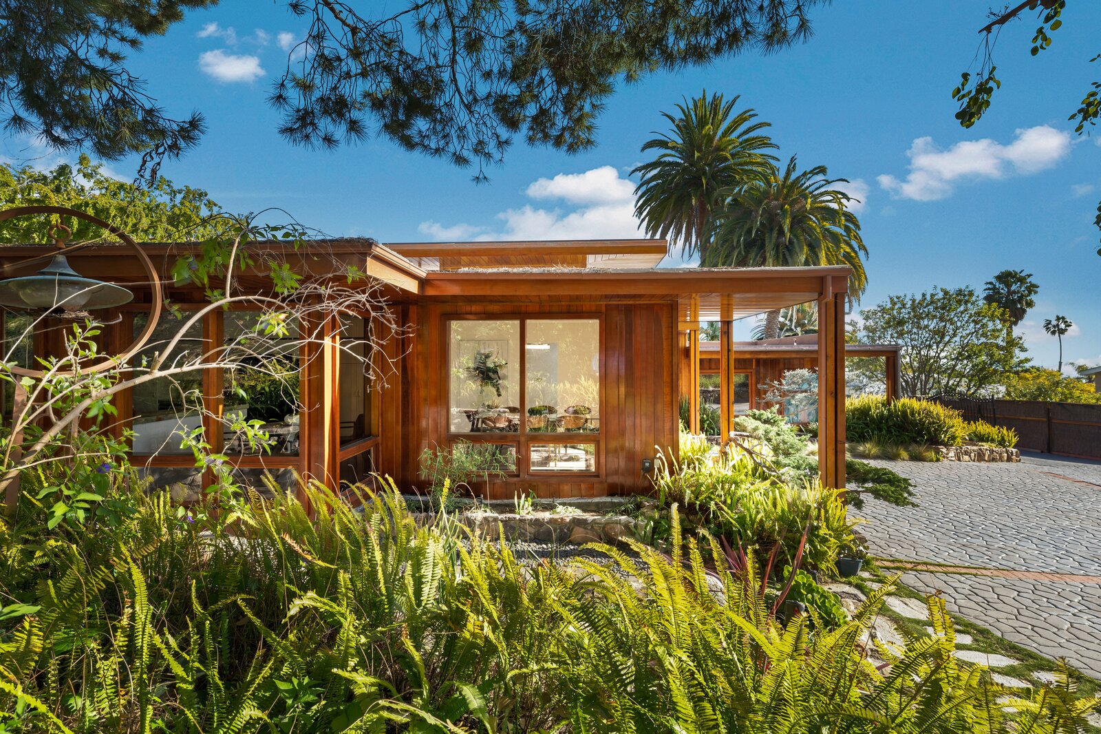 Photo 2 of 14 in Secluded Mid-Century Modern Compound Boasting 800 ...