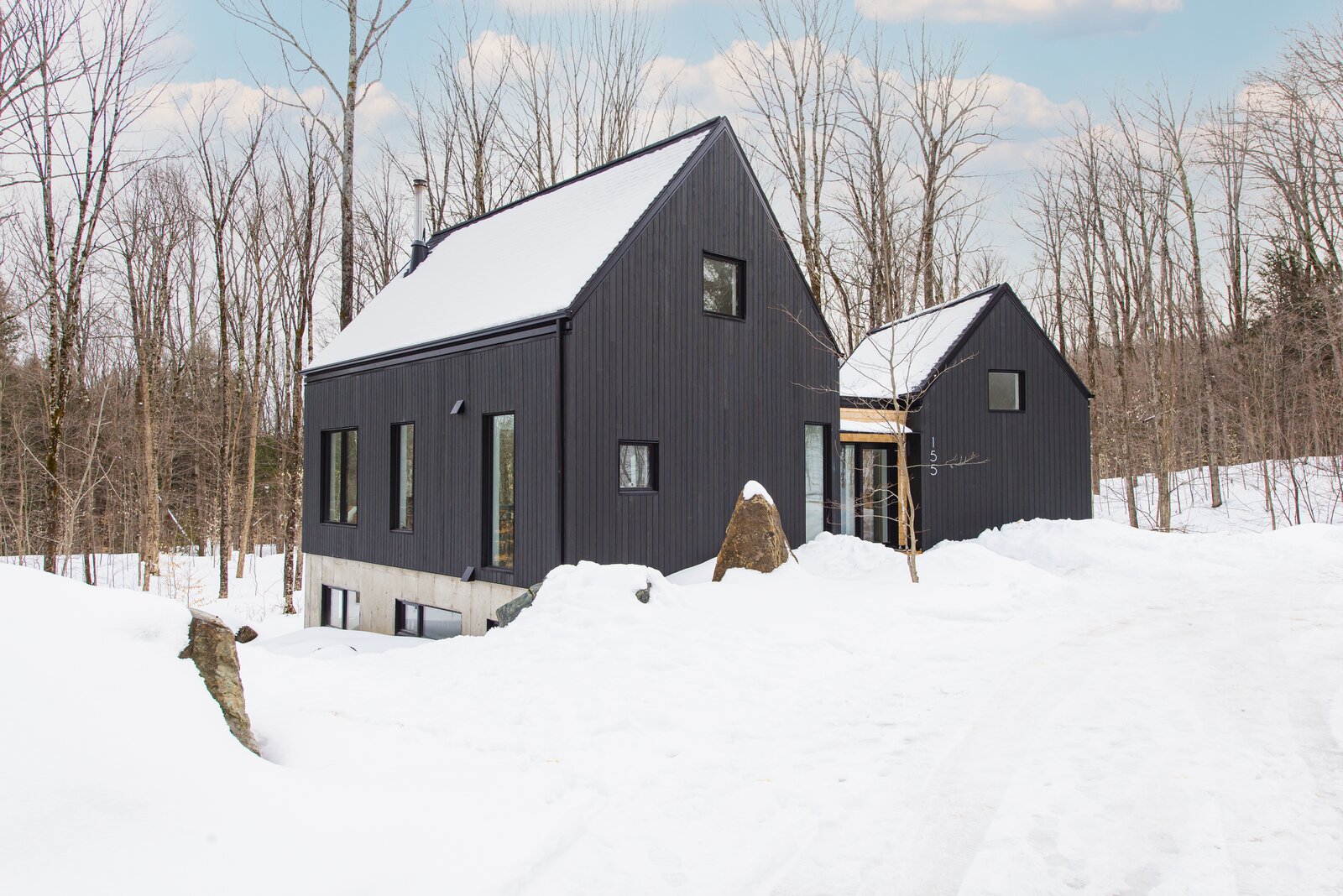 Photo 1 of 50 in In Quebec, a Pair of Black Gables Form a Scandinavian ...