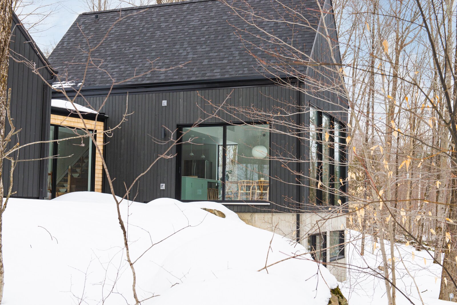 Photo 1 of 50 in In Quebec, a Pair of Black Gables Form a Scandinavian ...