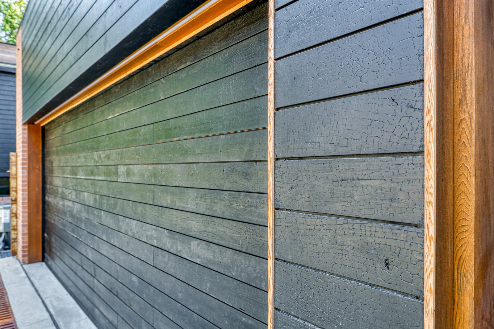 Photo 9 of 18 in Shou Sugi Ban Garage Doors by Doorvana Garage Doors ...