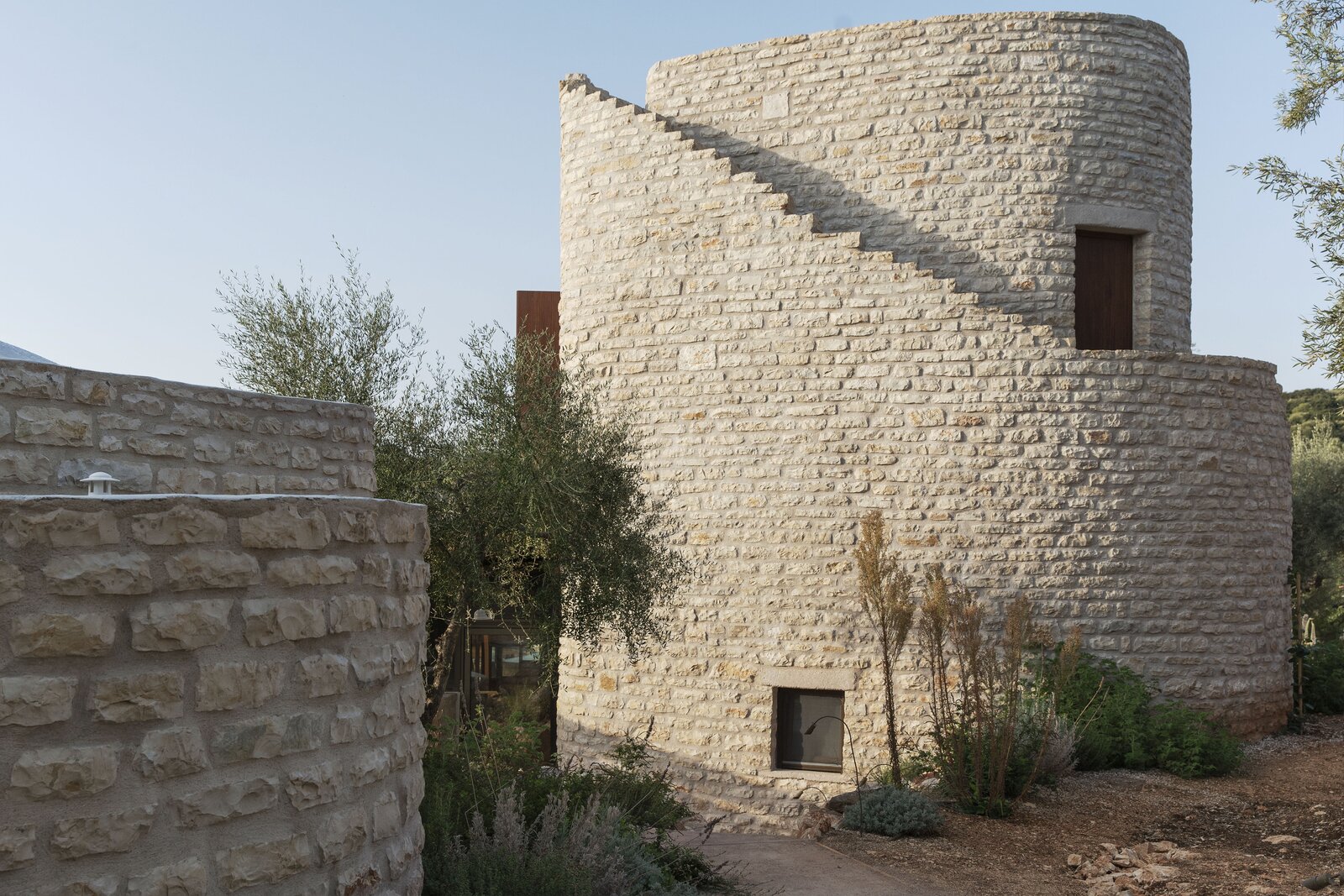 Photo 10 of 21 in A Cluster of Earthy, Stone-Built Huts Form a Far-Out ...