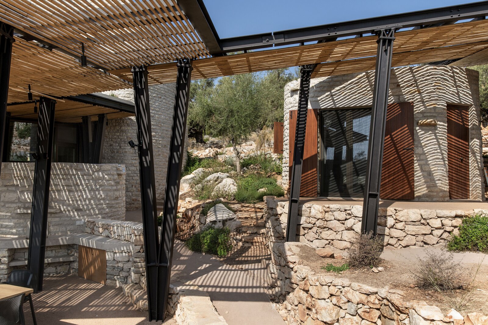 Photo 9 of 21 in A Cluster of Earthy, Stone-Built Huts Form a Far-Out ...