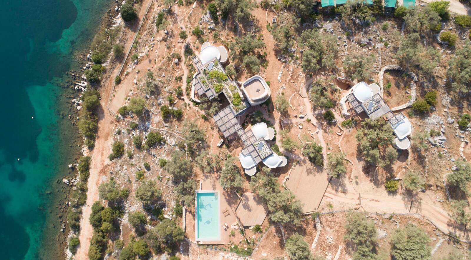 Photo 1 of 21 in A Cluster of Earthy, Stone-Built Huts Form a Far-Out ...